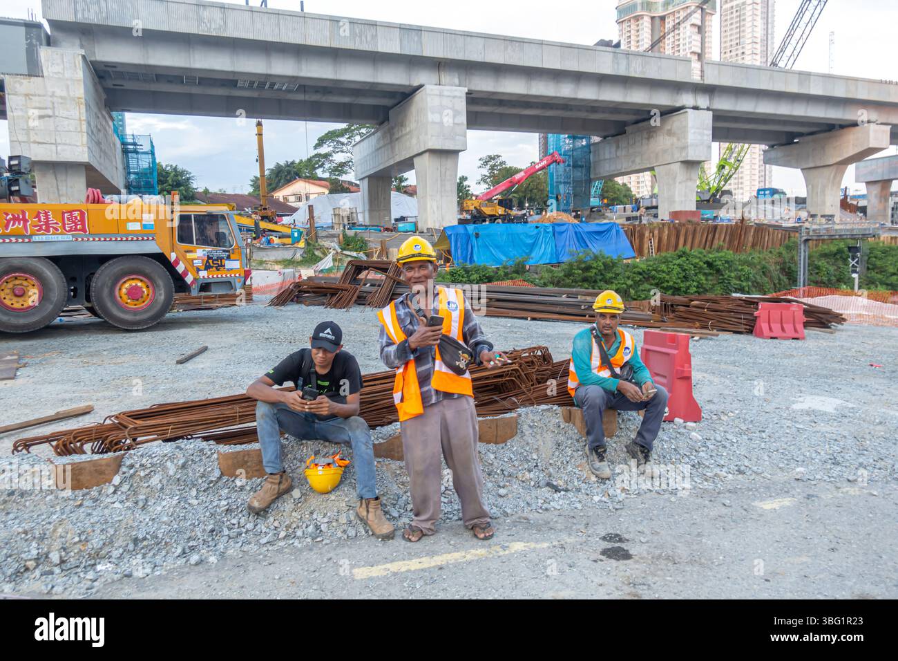 workers at construction site of the Johor Bahru-Singapore Rapid Transit ...