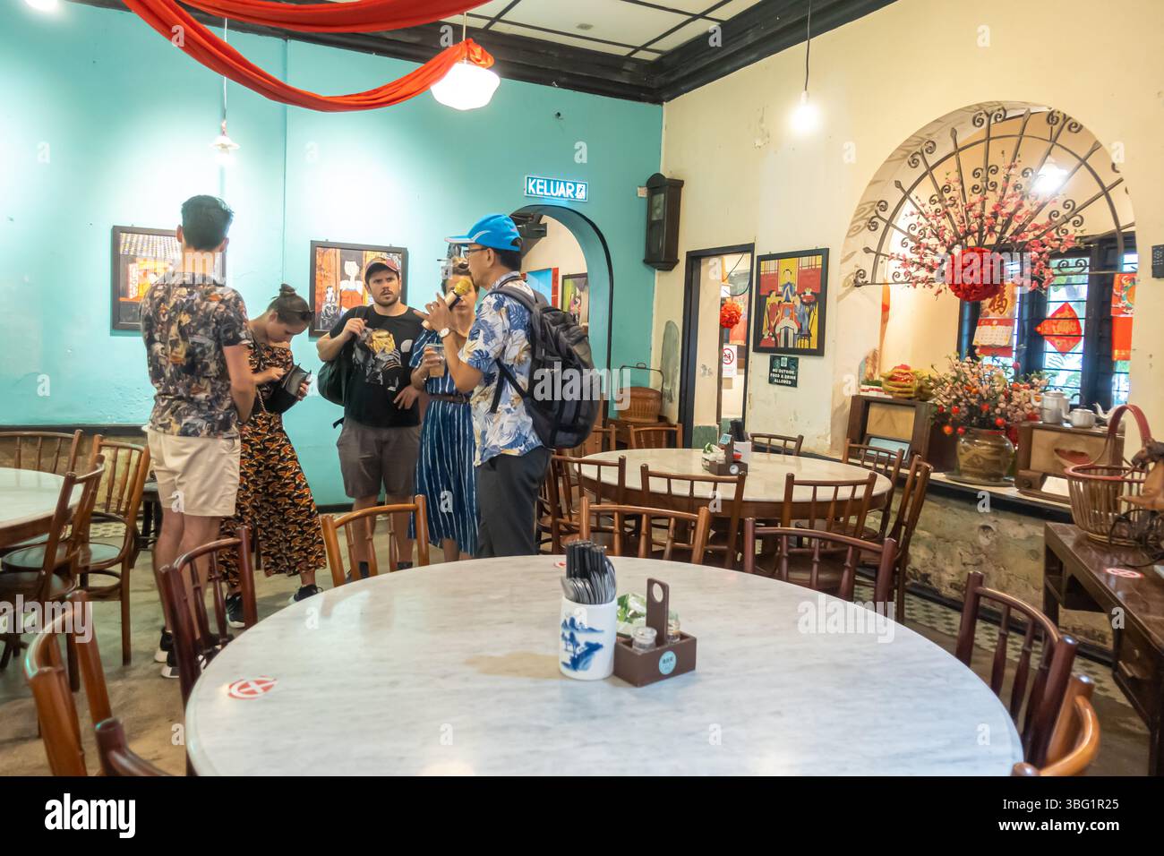 Tourists with tour guide in Kafei Dian historic interior museum , Kuala ...