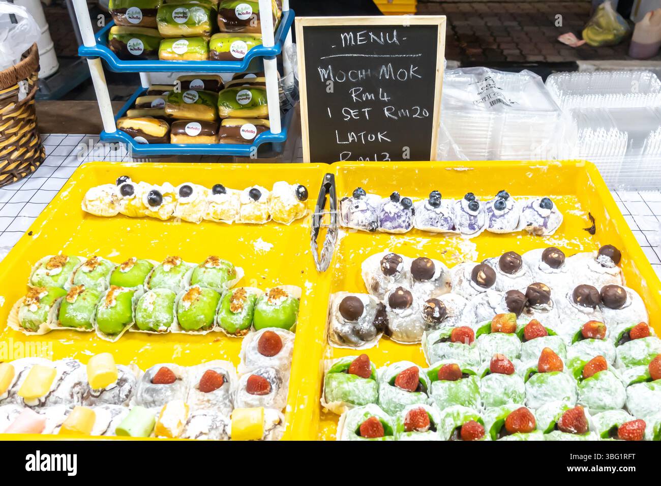 Mochi mok cakes sold at the stall in Melaka night market, Malaysia ...