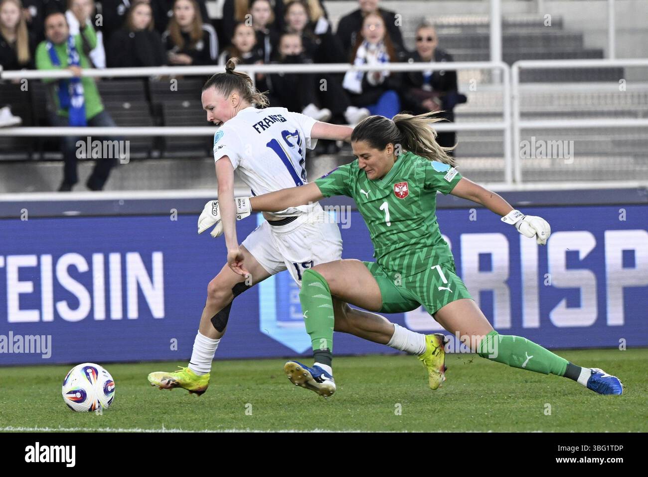 Serbia's goalkeeper Milica Kostic, right, and Finland's Sanni Franssi ...
