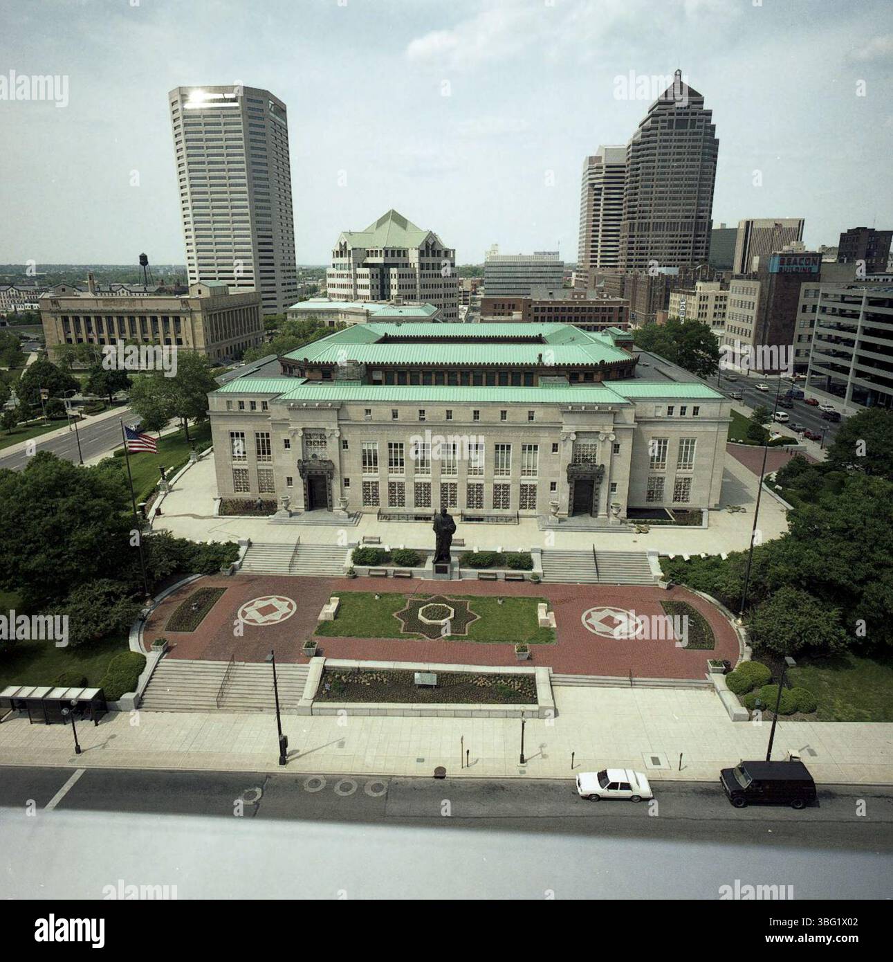 A 1993 photograph of Columbus City Hall featuring the statue of ...