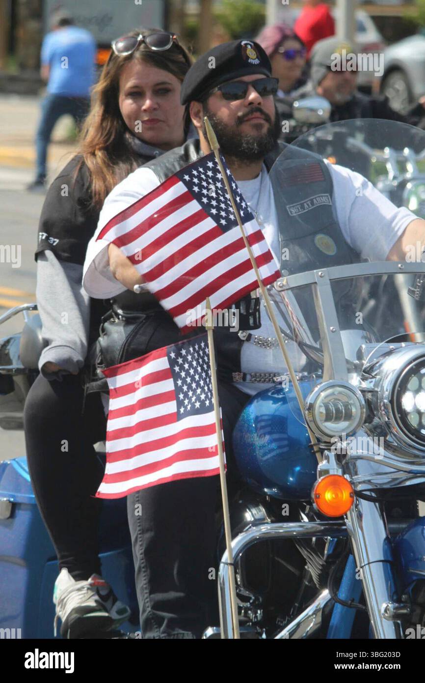 Various members of veterans organizations, and their supporters, drive ...