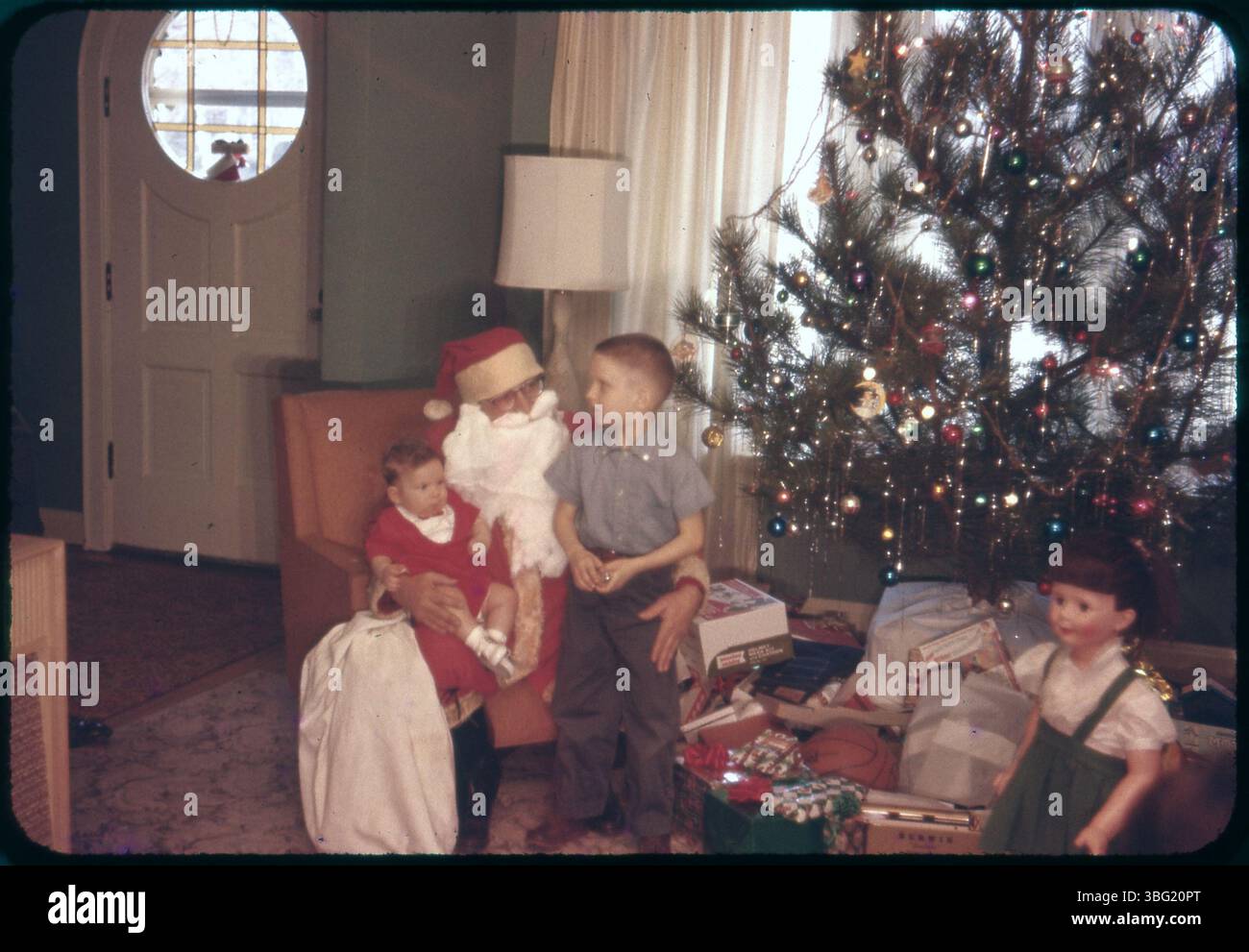 A Christmas scene from 1959 at the Mosbacher home, where Santa Claus ...