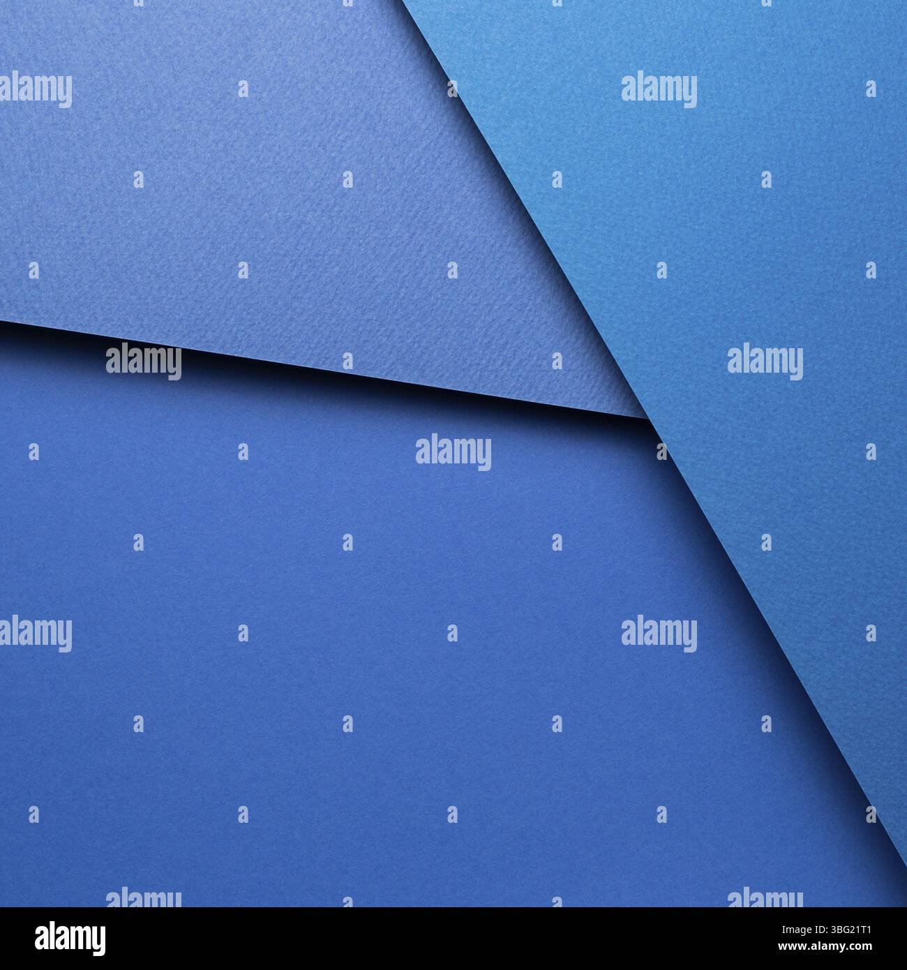 Abstract blue layered color paper background Stock Photo - Alamy