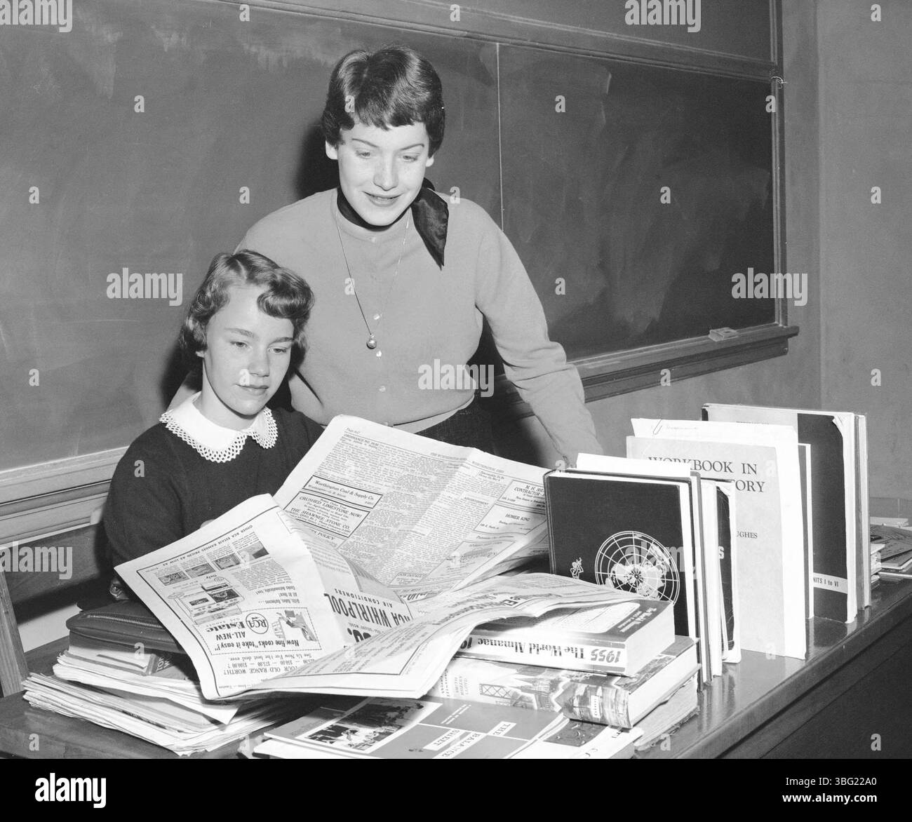 Photograph by A.V. Shirk of a teacher and student at Worthington High School, circa 1955. The ...