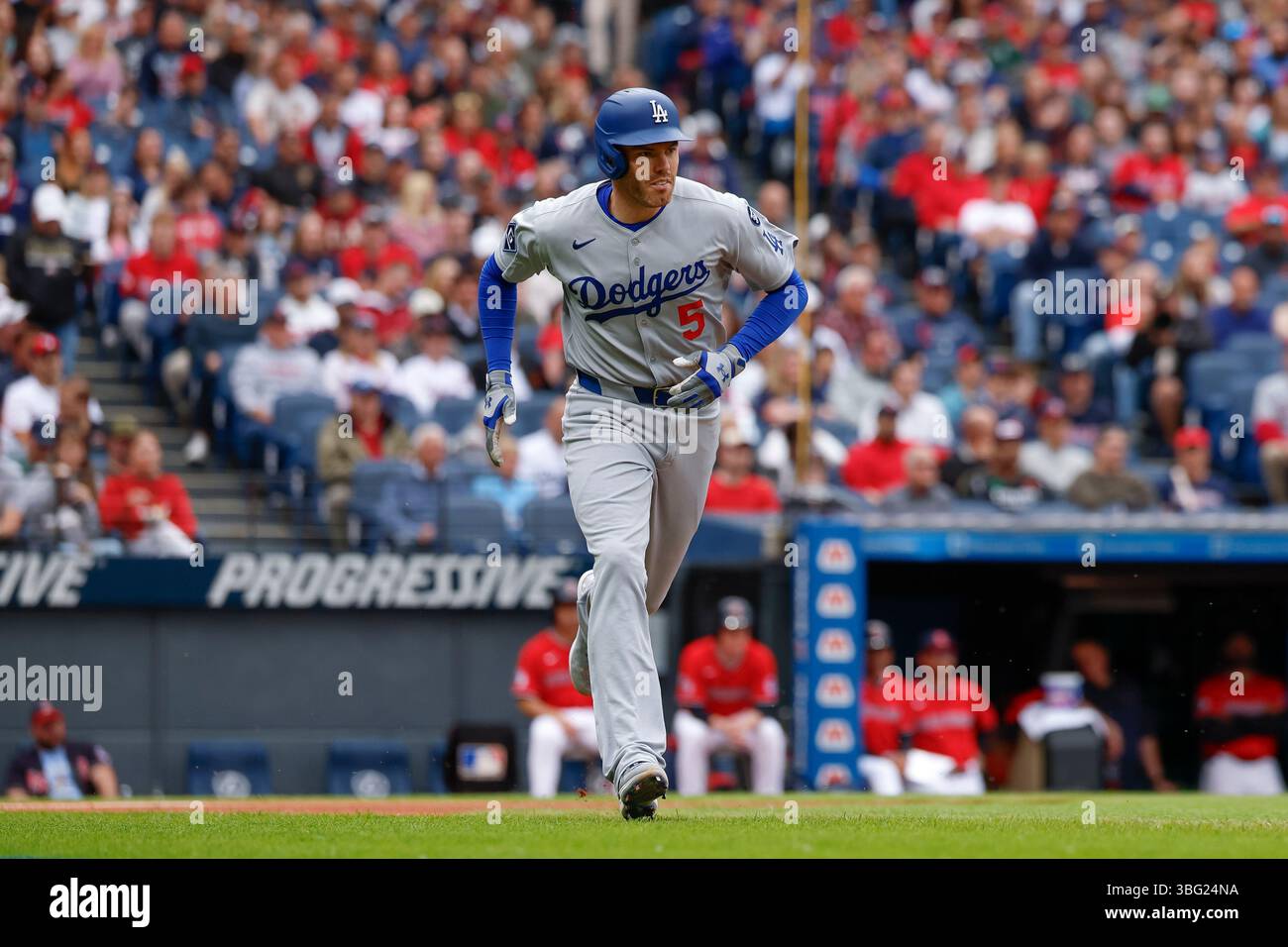 Freddie Freeman #5 of the Los Angeles Dodgers runs to first base on a ...