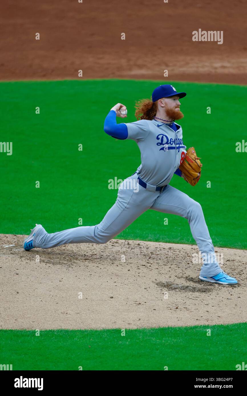 Dustin May #85 of the Los Angeles Dodgers throws a pitch during a game ...