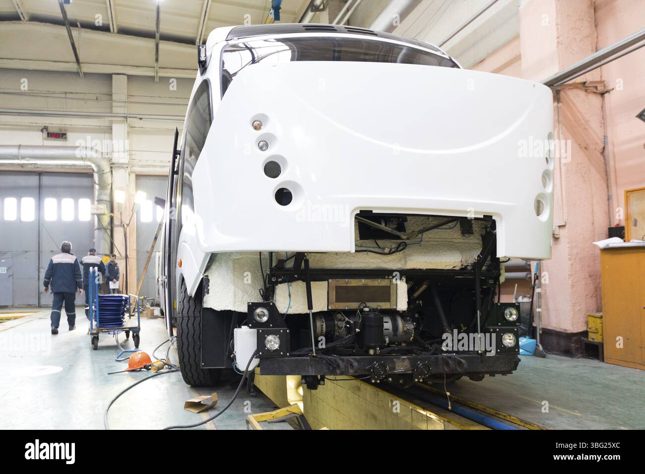 One working day of modern automatic bus manufacturing with unfinished ...