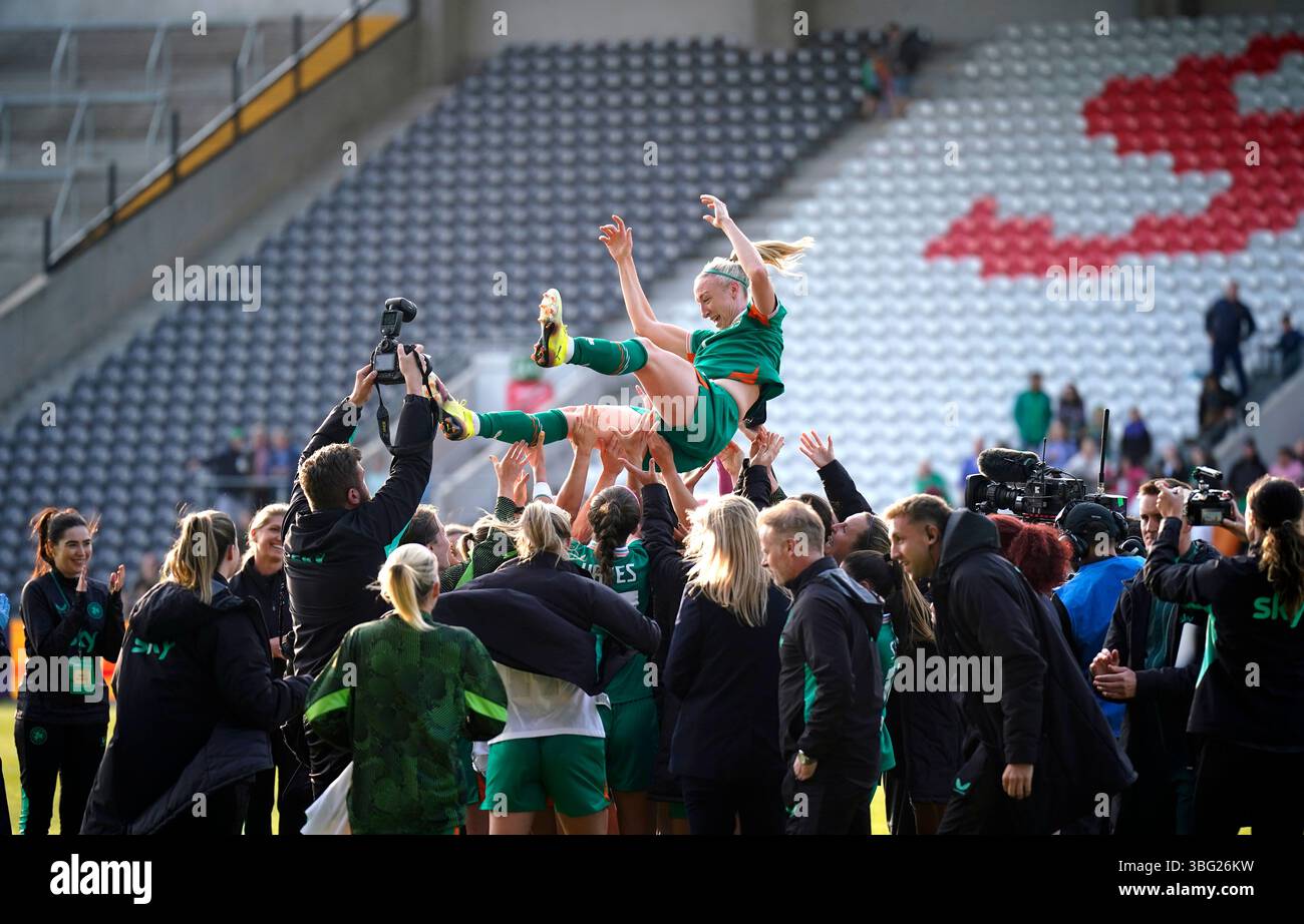Republic of Ireland's Louise Quinn thrown in the air by team-mates to ...