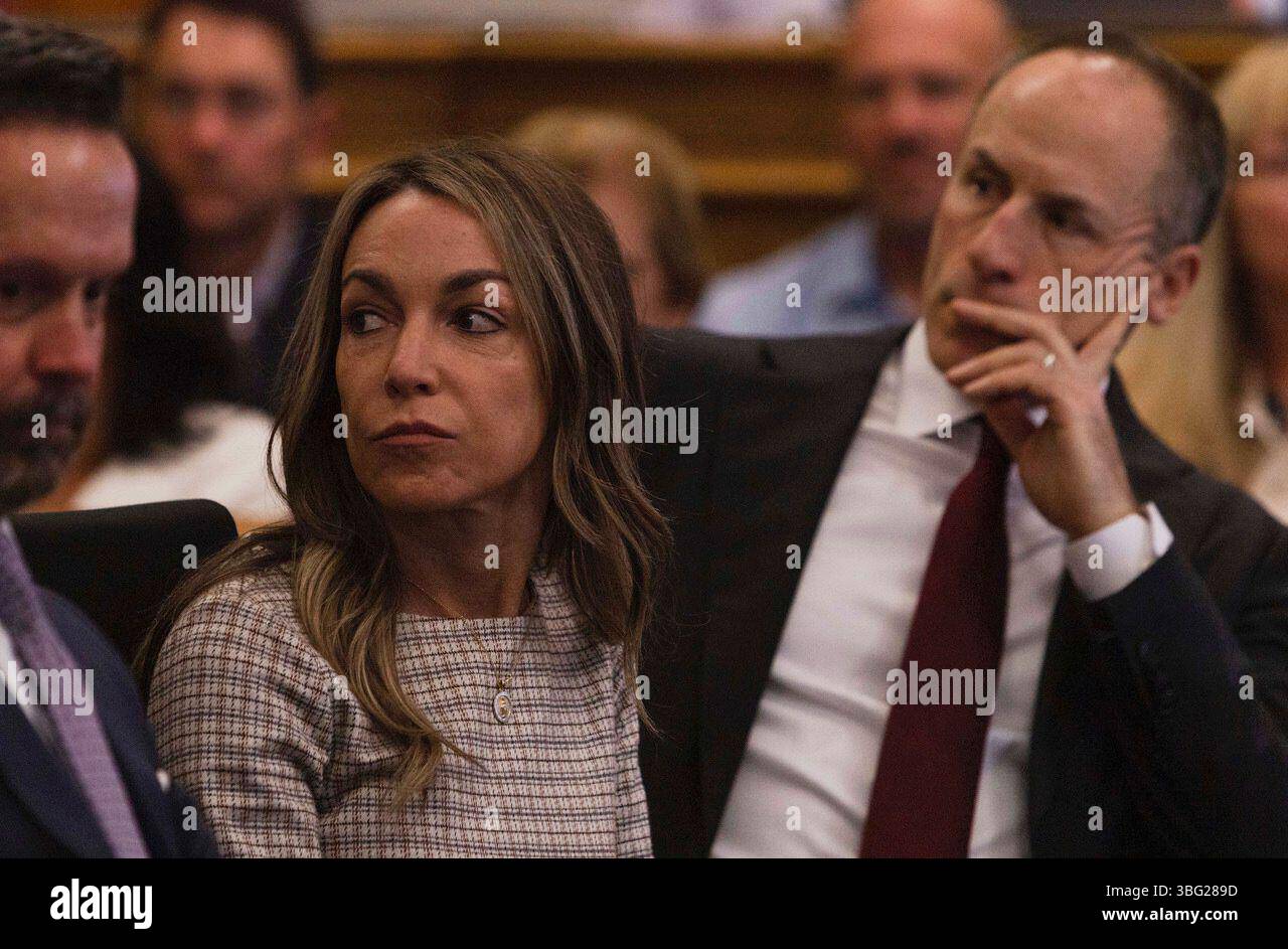 Karen Read and defense attorney David Yannetti listen to testimony ...