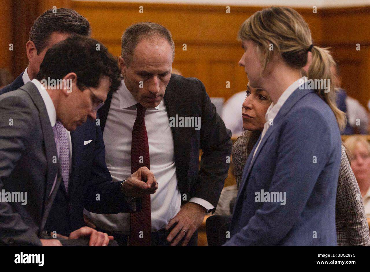 Karen Read huddles with her defense team, attorneys Elizabeth Little ...