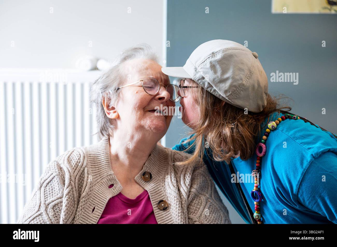 42 yo daughter with Down Syndrome embracing her 85 yo mother, Tienen ...