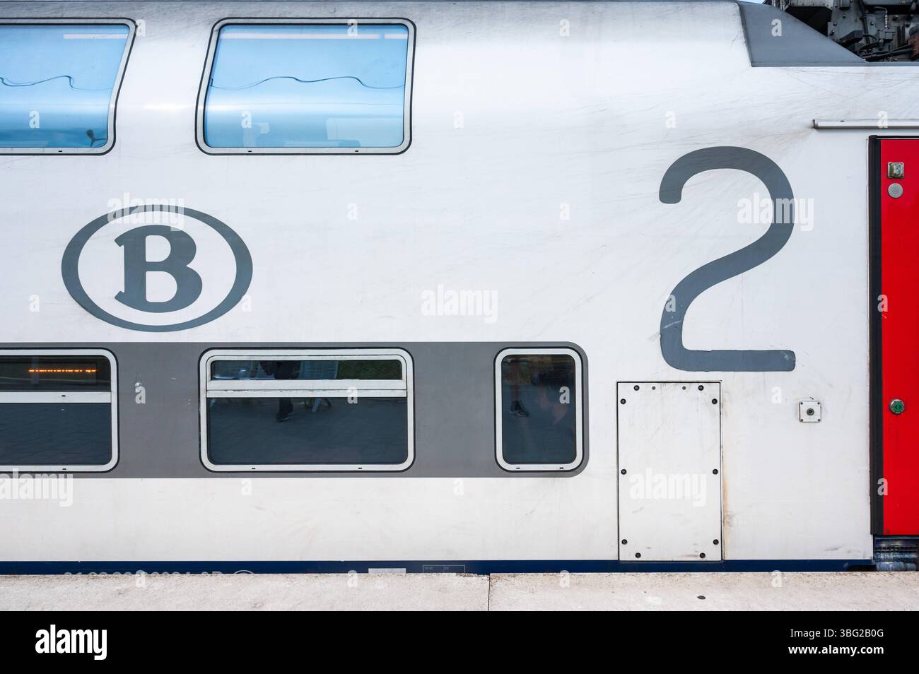 Double deck IC train waiting at the platform in TienenTienen, Flemish ...