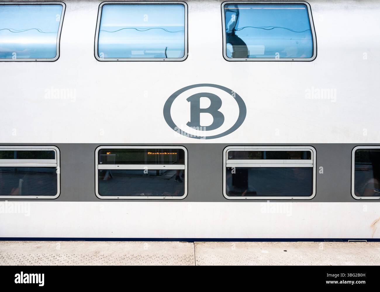 Double deck IC train waiting at the platform in TienenTienen, Flemish ...