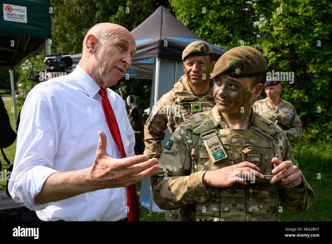 Defence Secretary John Healey speaks with Private Charlie Bugby of the ...