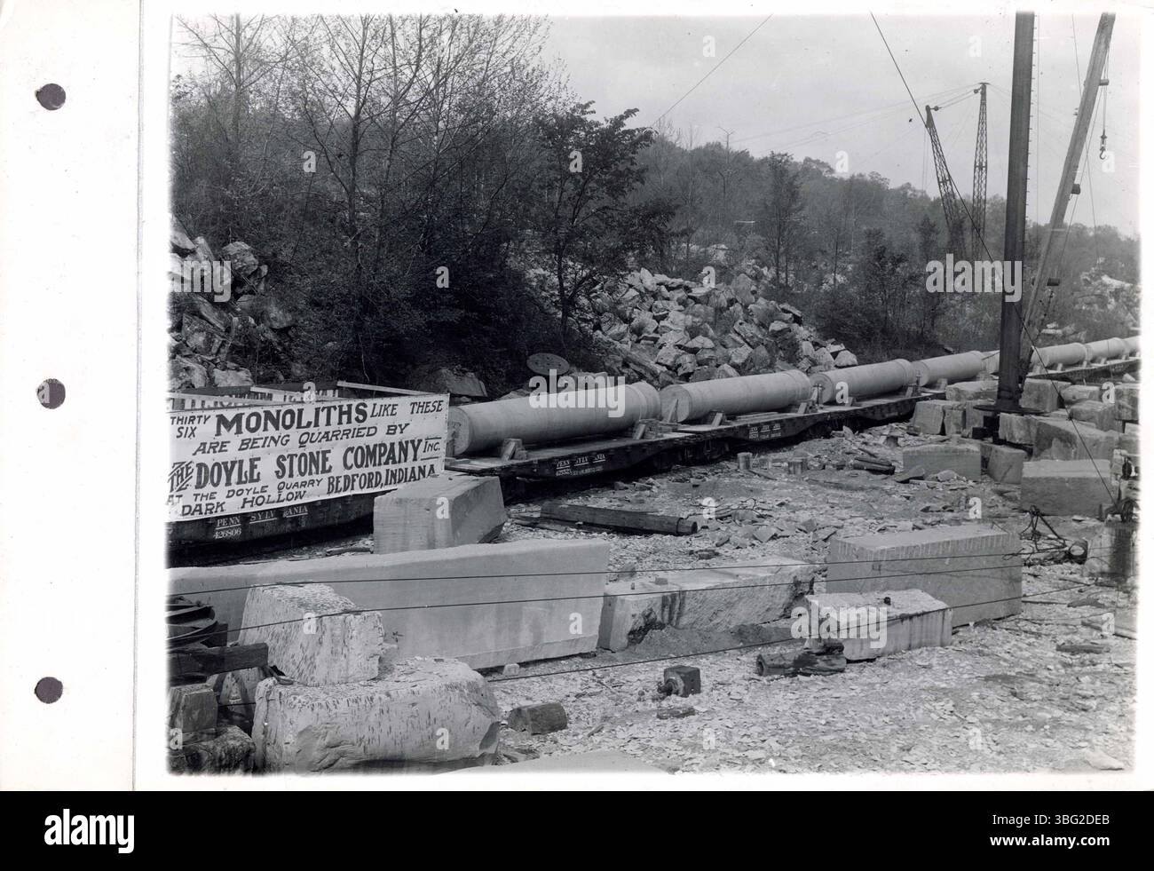 This binder contains more photographs showcasing buildings and ...