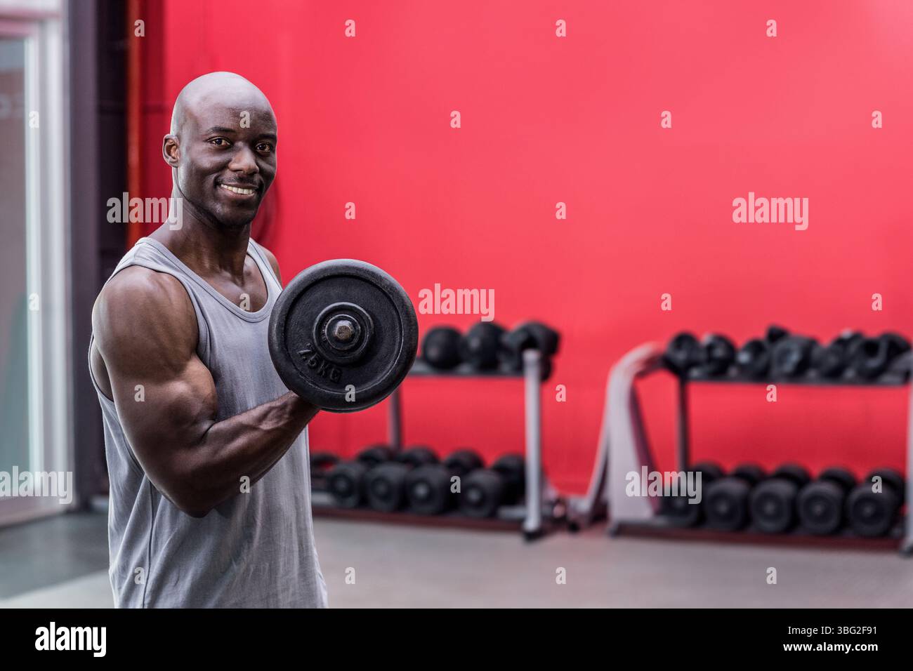 African man performing bicep hi-res stock photography and images - Alamy