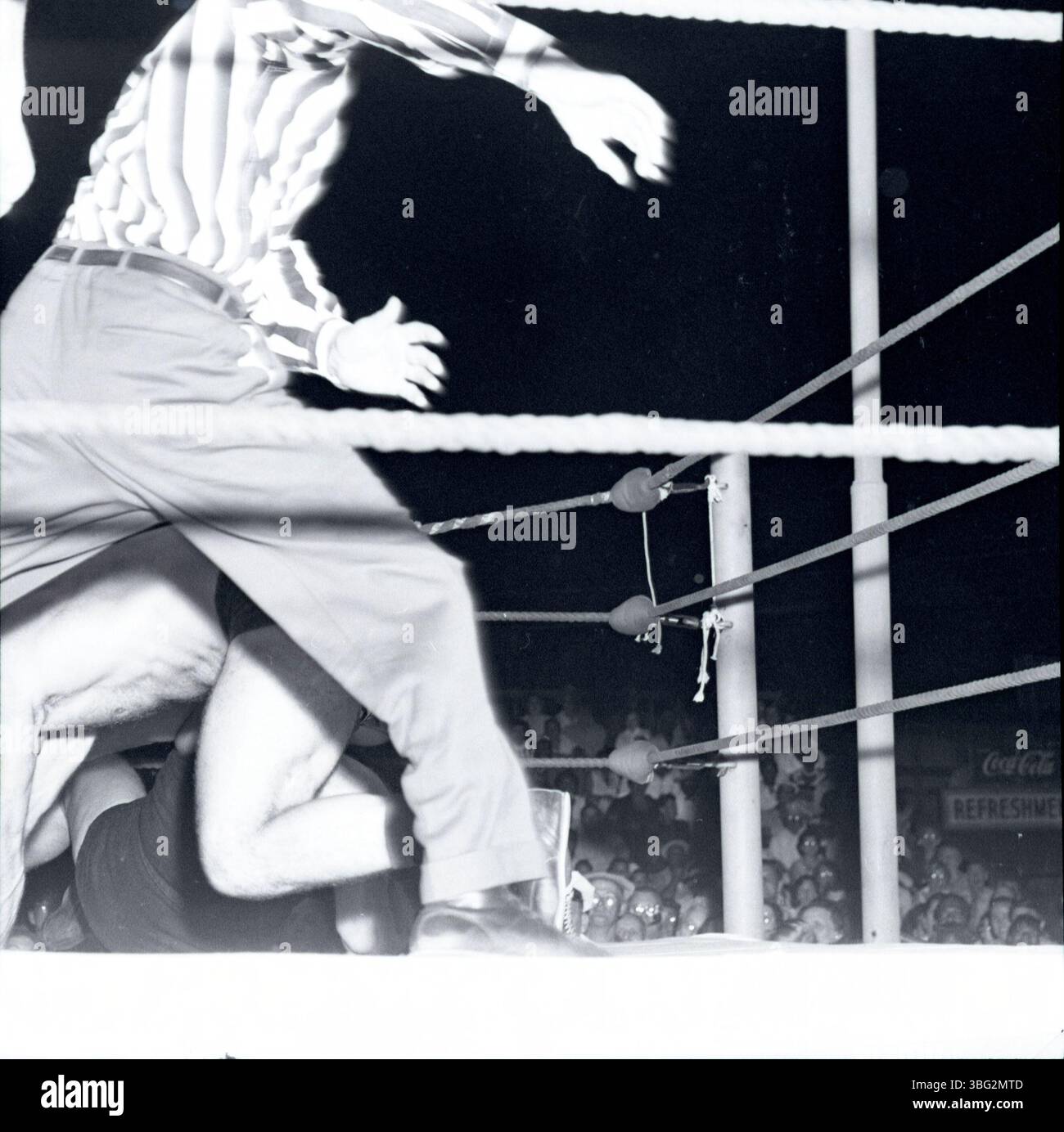 A.V. Shirk's 1958 photographs showcase professional wrestling events ...