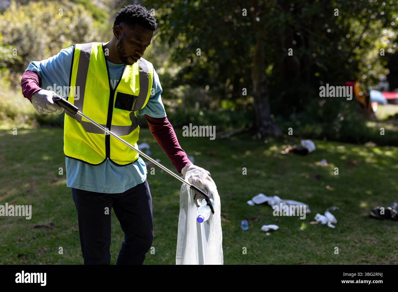 Man collecting waste in open hi-res stock photography and images - Alamy