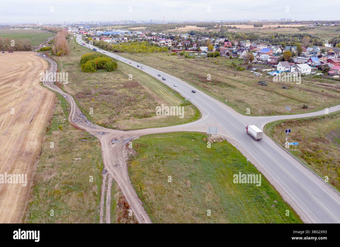 Aerial view of the roads leading to a large industrial city in Siberia ...