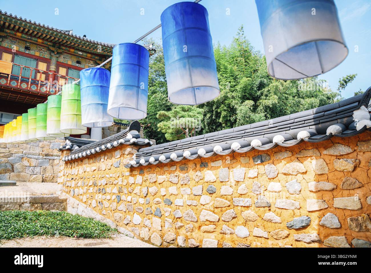 Colorful lanterns and Korean traditional stone wall at Beomeosa temple ...
