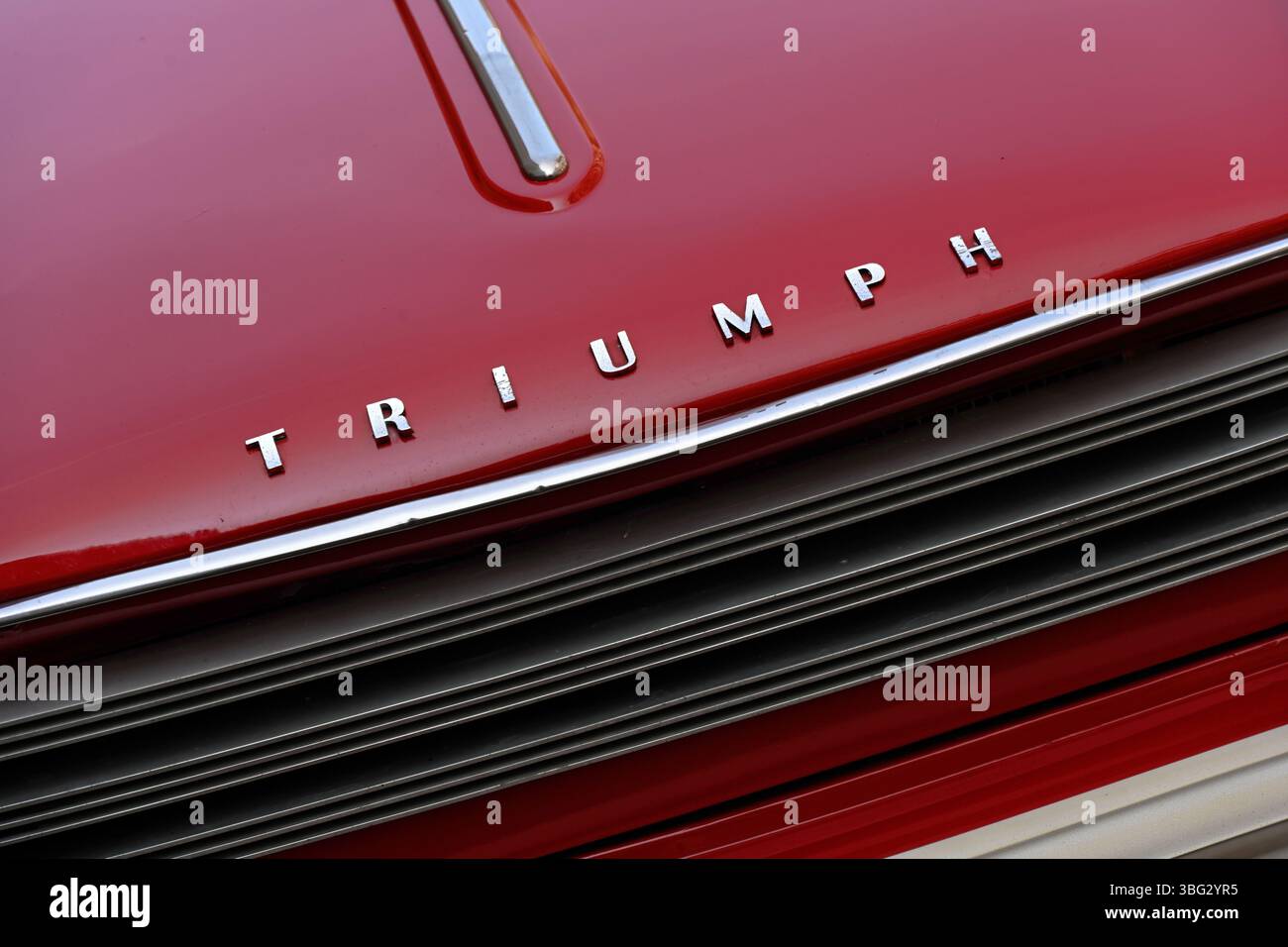 LONDON, UK - MAY 31, 2025: Chrome name of red Triumph Herald ...
