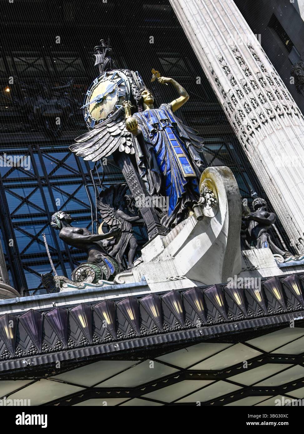 LONDON, UK - MAY 31, 2025: The Queen of Time statue above entrance to ...
