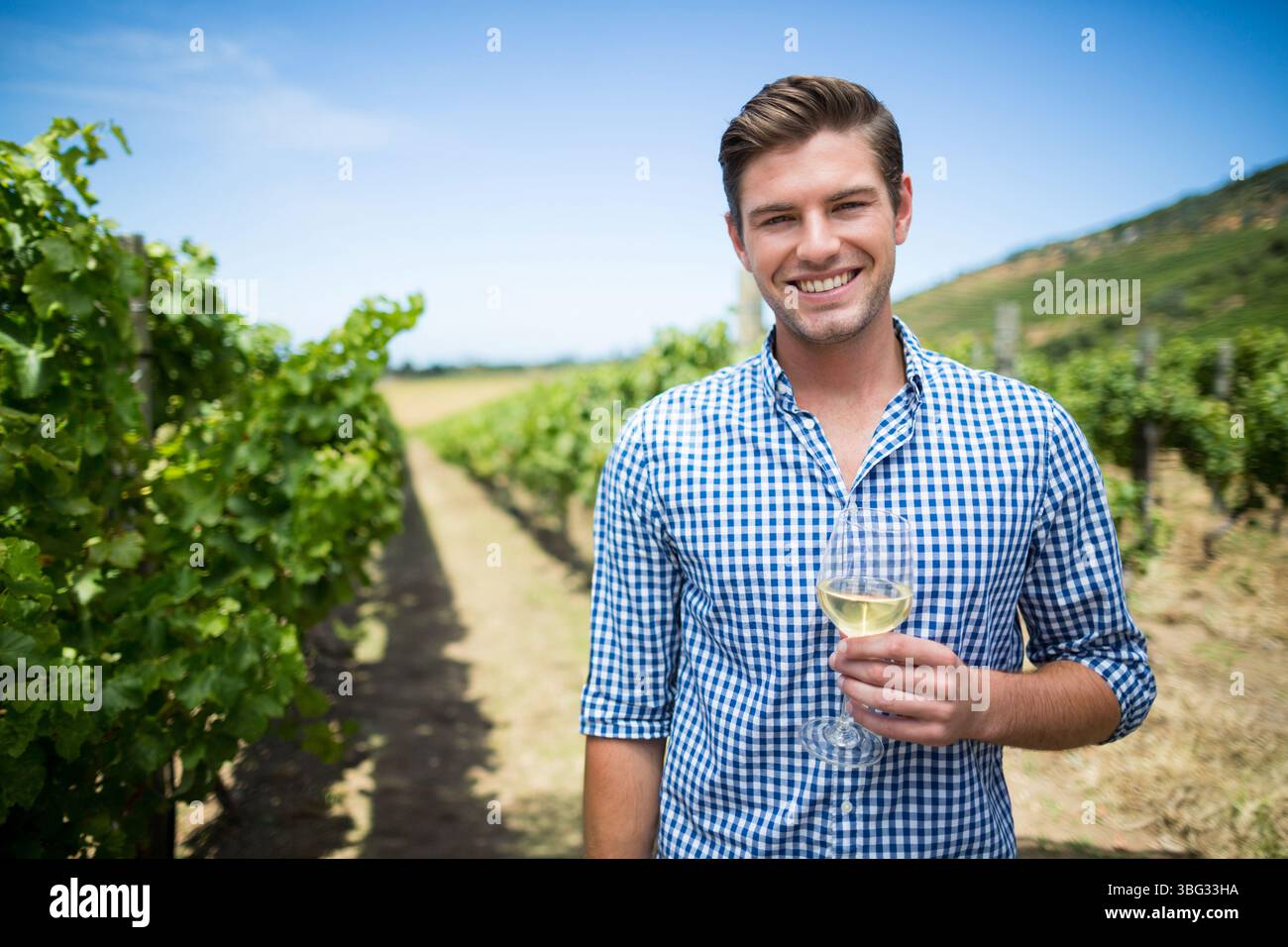 Man standing amid rows hi-res stock photography and images - Alamy
