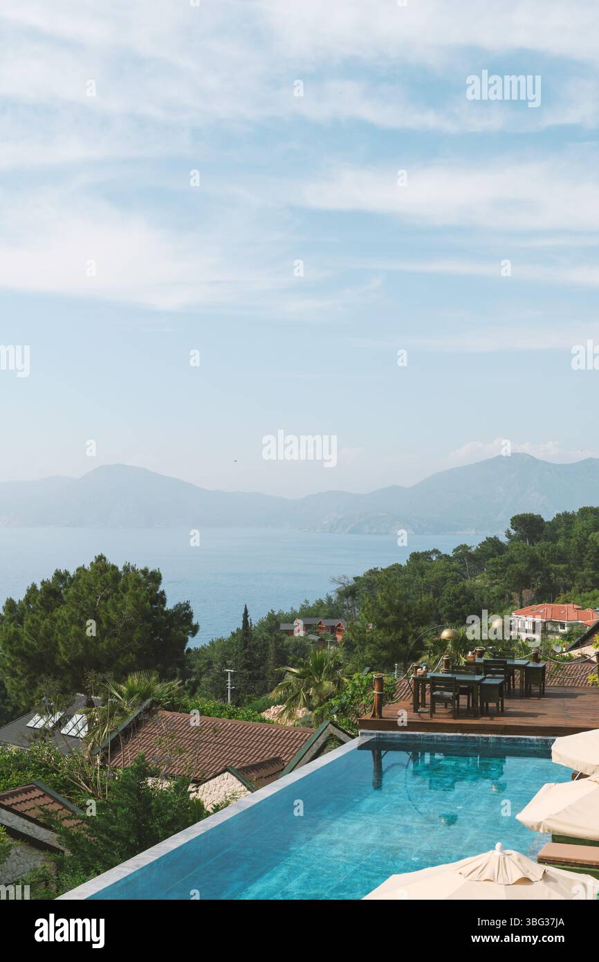 A stunning infinity pool merges with endless ocean views at a luxury ...