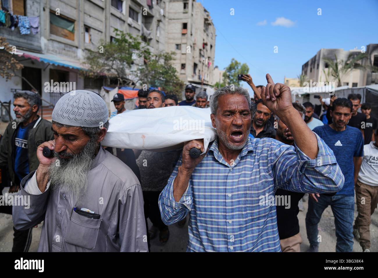 Palestinians carry Reem Al-Akhras, who was killed while heading to an ...