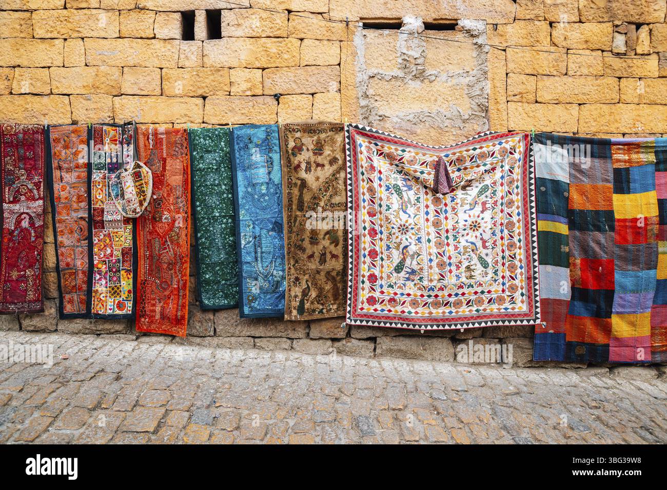 Indian style oriental carpets at old street market in Jaisalmer, India ...