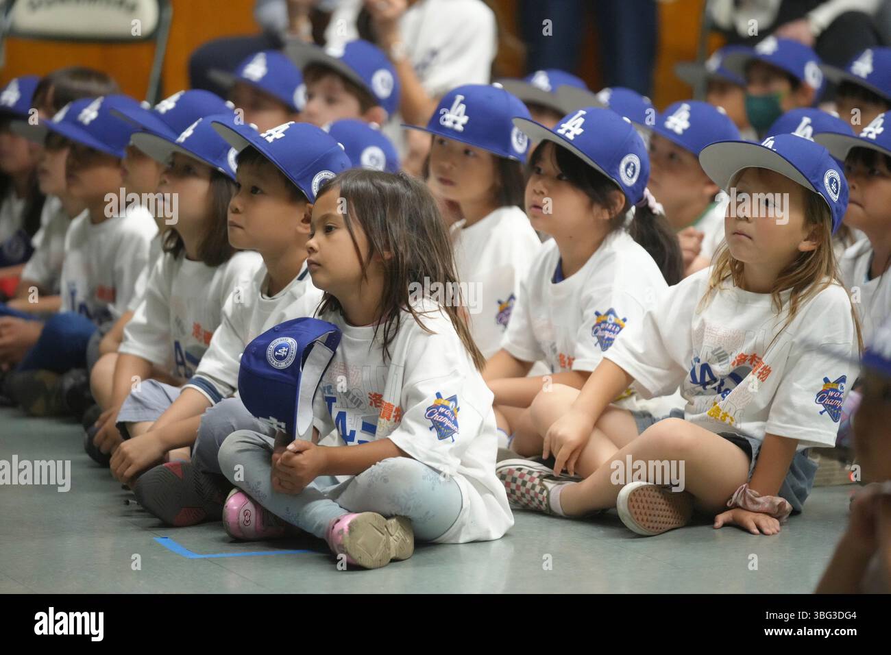 Los Angeles Dodgers pitcher Yoshinobu Yamamoto reads a book in Japanese ...