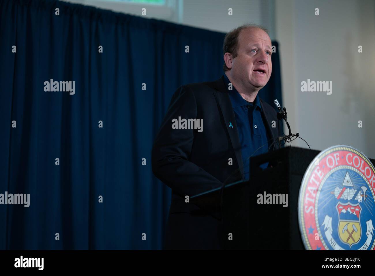 Denver, Colorado, USA. 3rd June, 2025. Gov. Jared Polis speaks to ...