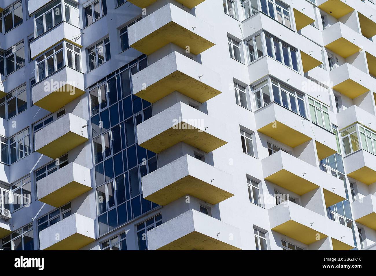 Corner of a newly built multi-story building. Construction Stock Photo ...
