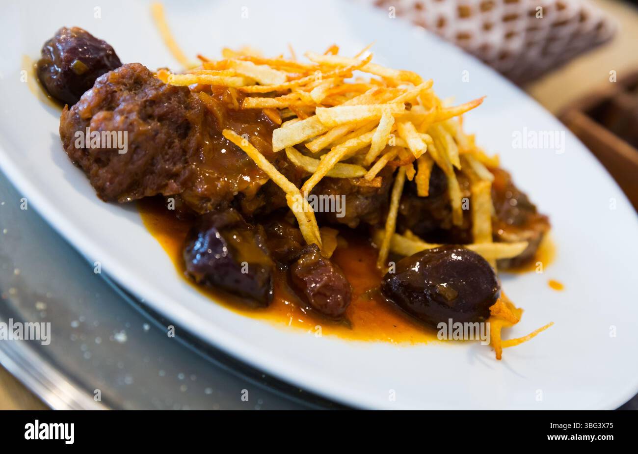 Catalan stew with raisins and plums Stock Photo - Alamy