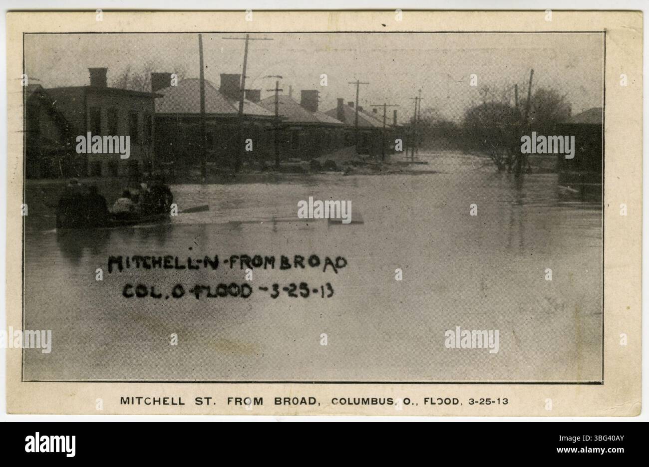 This black and white photograph shows a rescue boat navigating ...