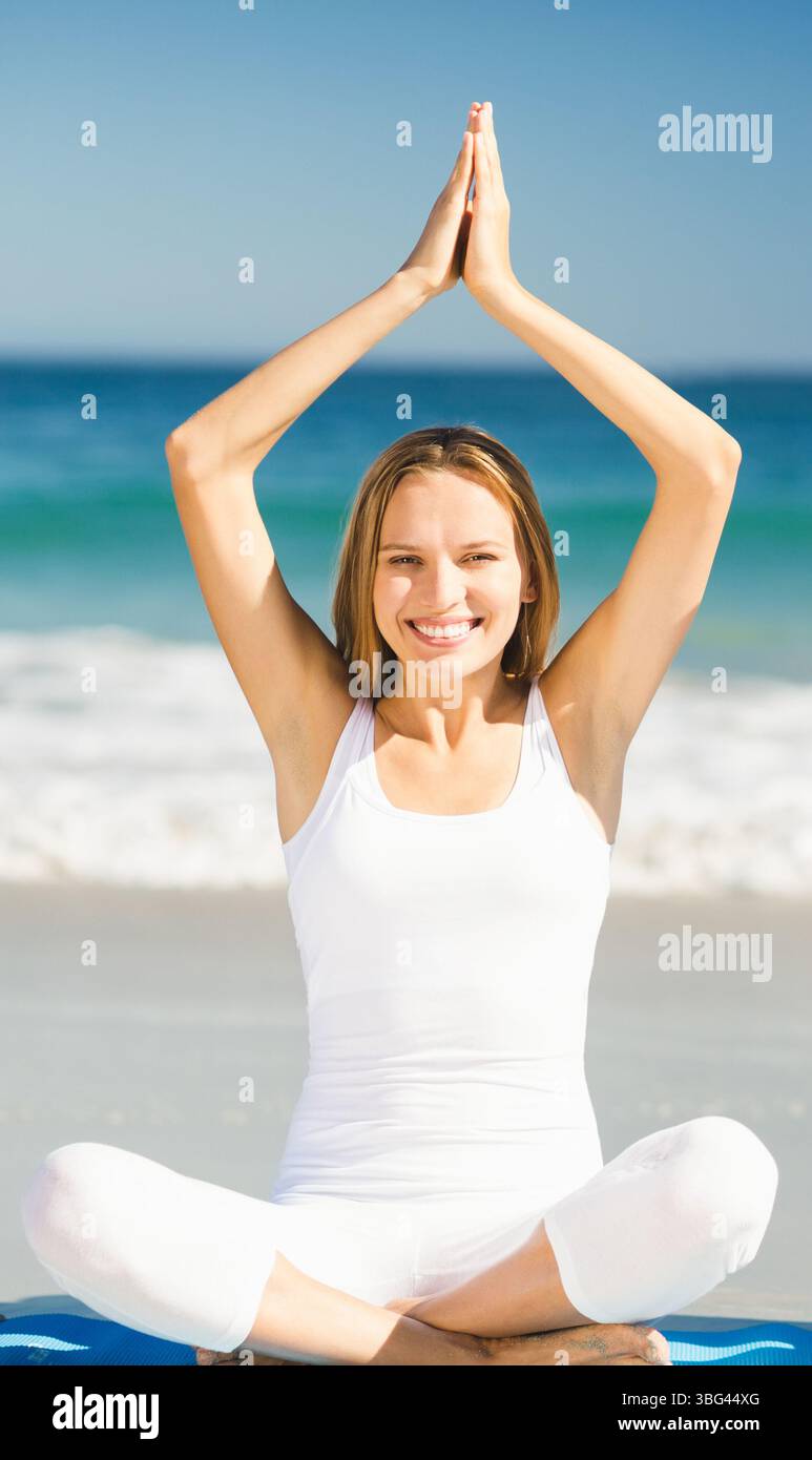 Yoga cross legged palms together hi-res stock photography and images ...