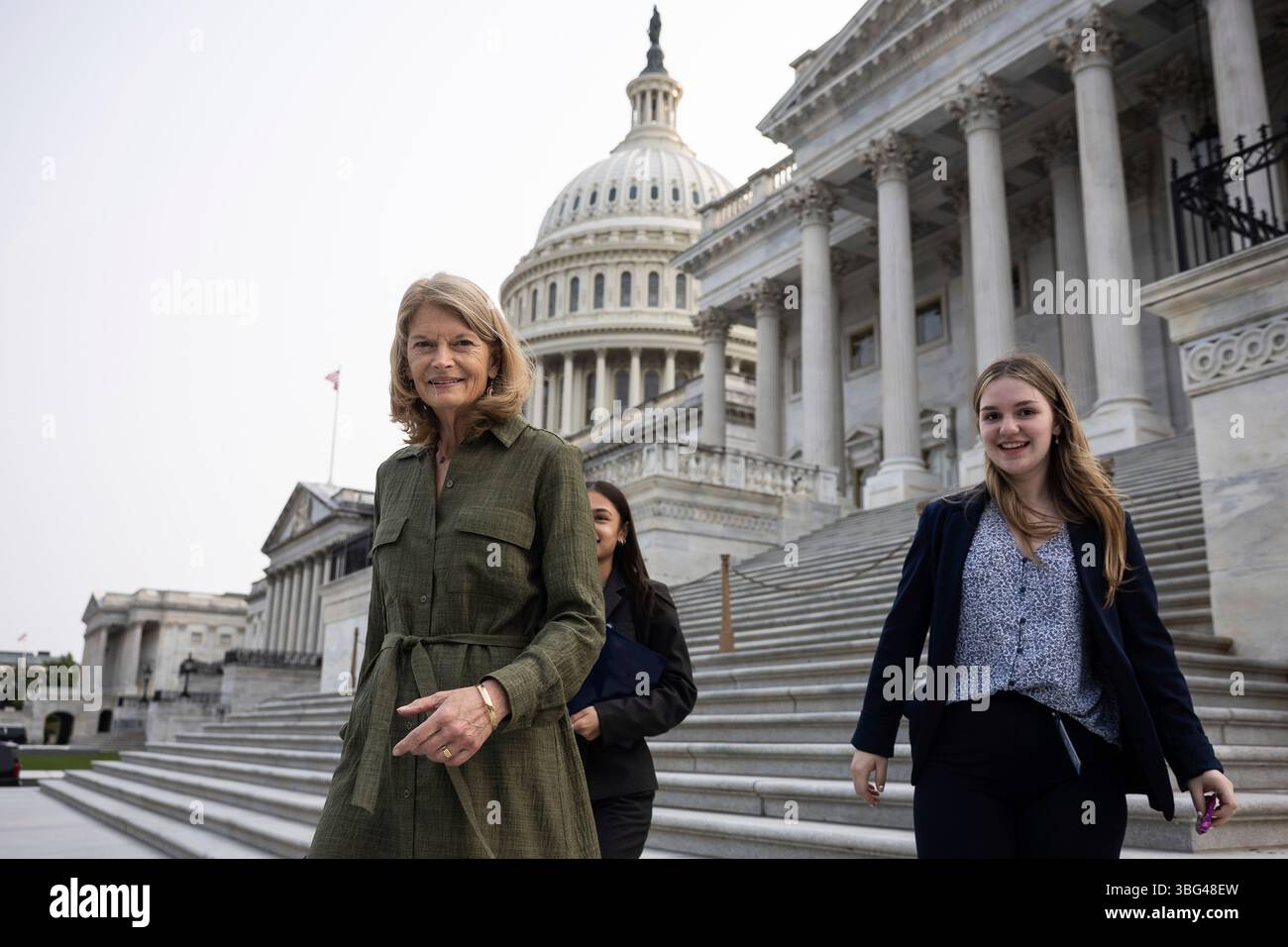 Sen. Lisa Murkowski (R-Alaska) is seen with visitors outside the U.S ...