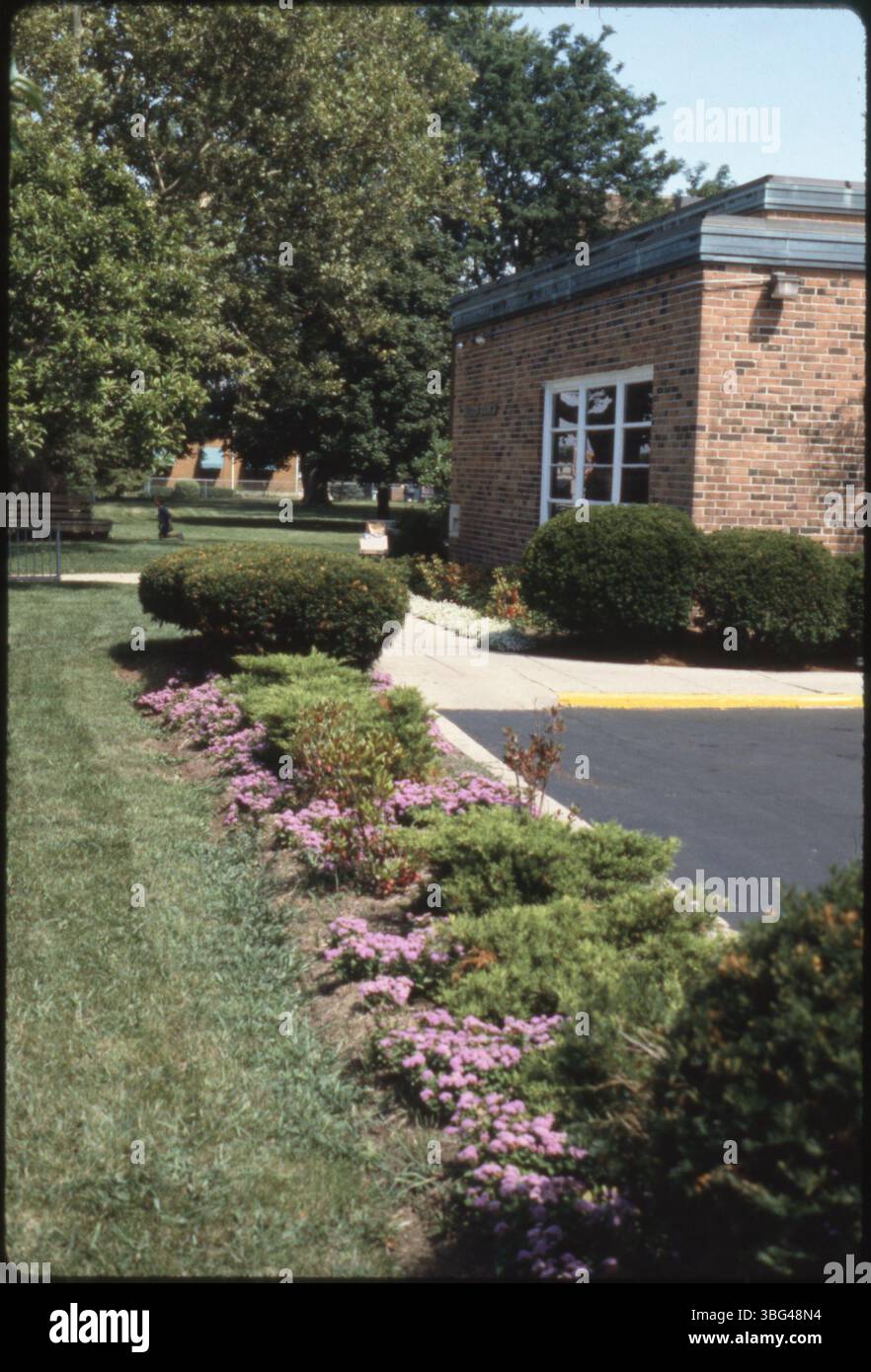 A 1990 view showing the Hilltop Branch Library in Columbus, Ohio, with ...