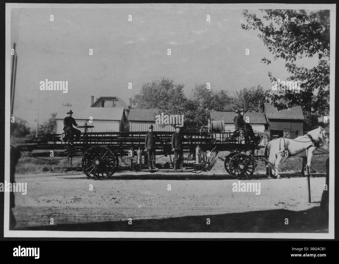 This 1888 photograph shows the Pride of Columbus horse-drawn ladder ...