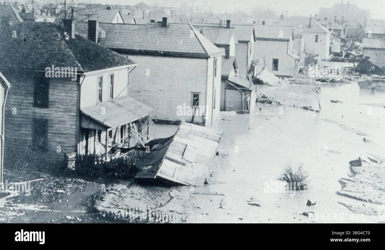 This 1913 image depicts floodwaters on Rogers Avenue in Columbus, Ohio ...