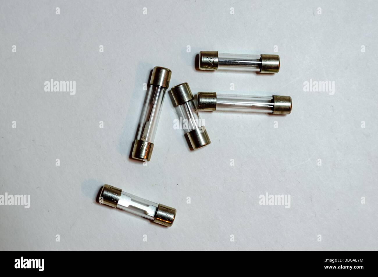 small grouping of automotive fuses on a white background Stock Photo ...