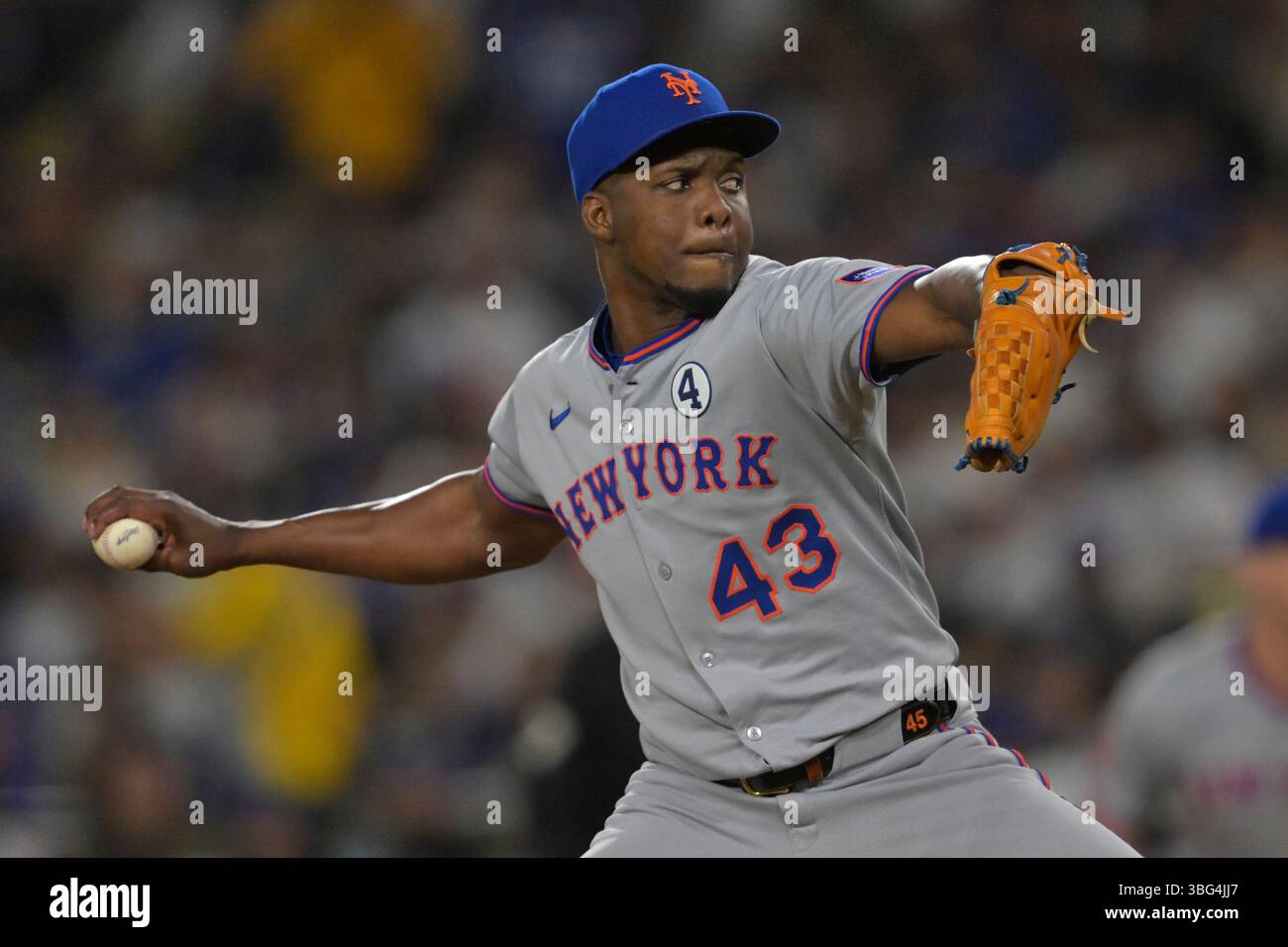 New York Mets relief pitcher Huascar Brazoban delivers to the plate ...