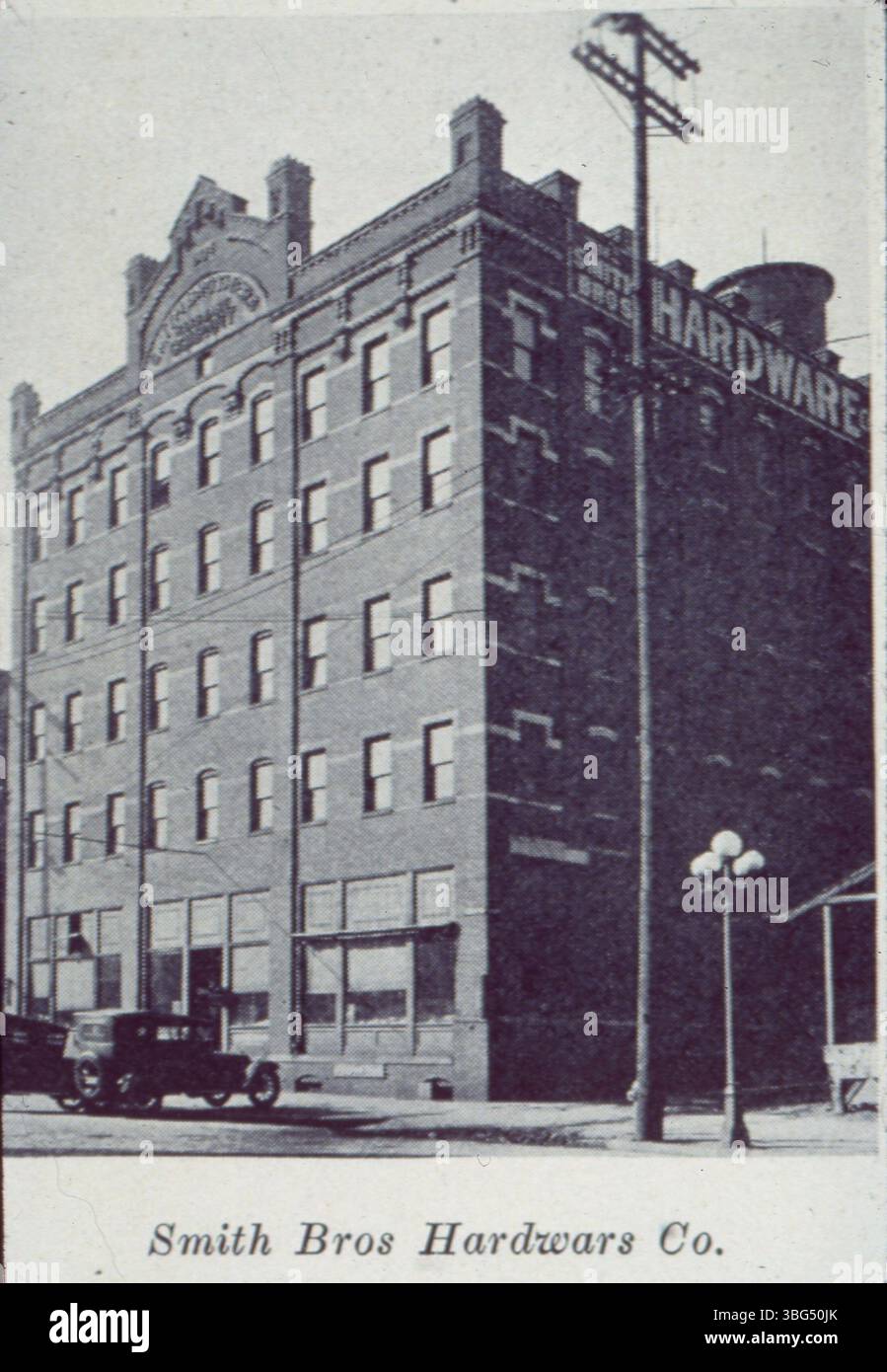 A black and white exterior photograph of the Smith Brothers Hardware ...