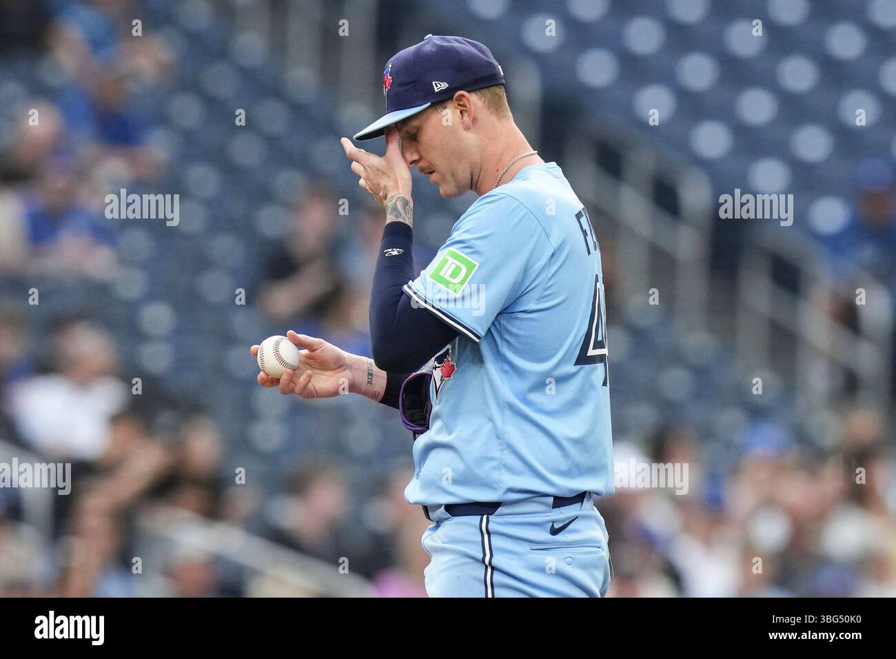 Toronto Blue Jays pitcher Bowden Francis (44) reacts as he stands on ...