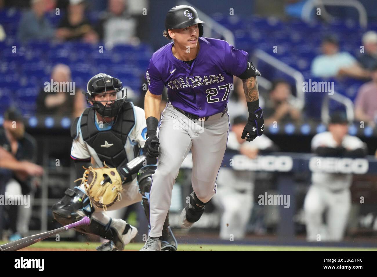Colorado Rockies' Jordan Beck (27) runs after hitting a RBI single to ...