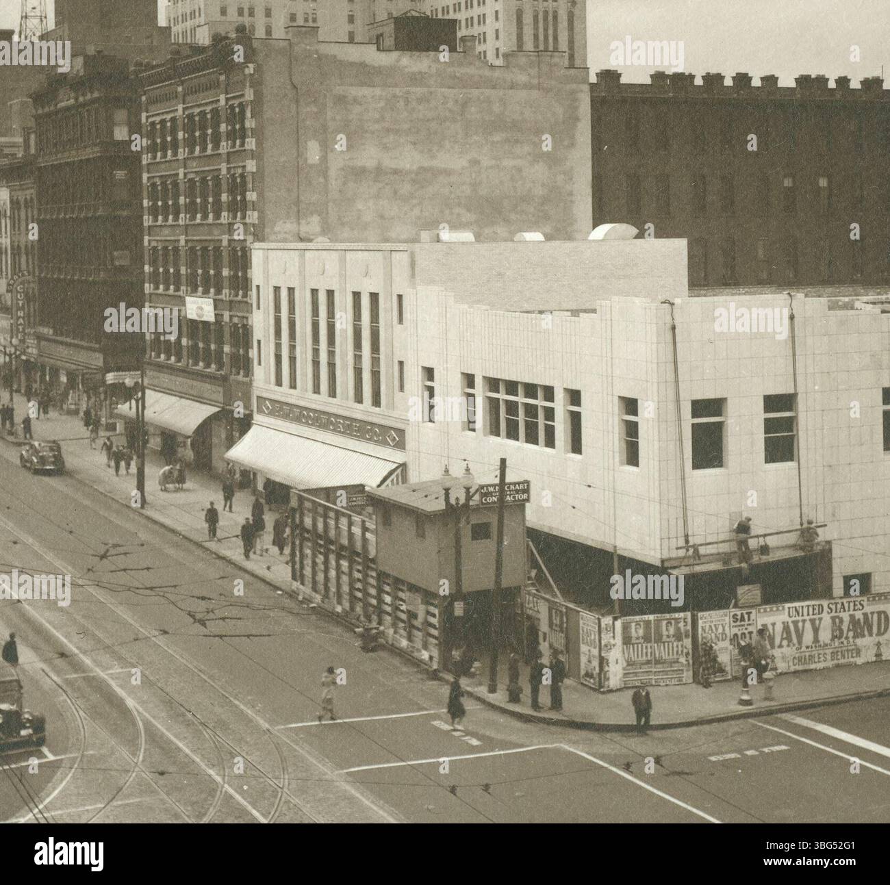 This black-and-white photograph depicts the intersection of High and ...