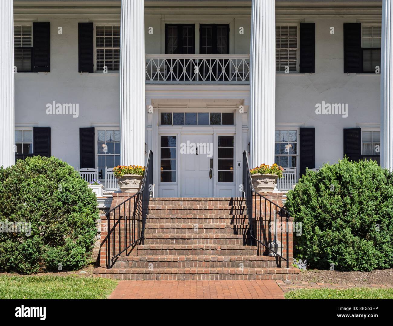 Rosemont Manor's elegant entrance featuring stately columns and ...