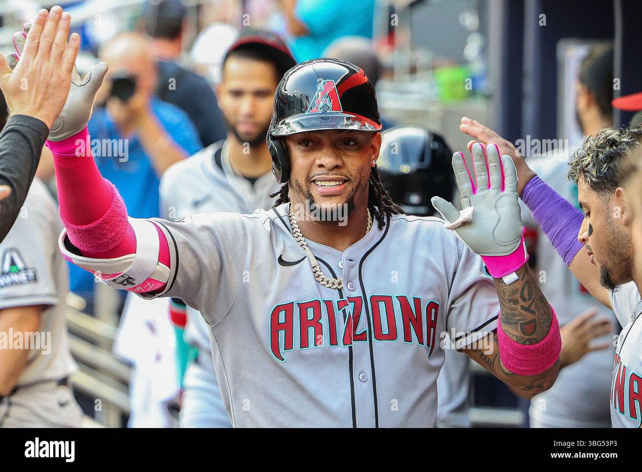 Arizona Diamondbacks' Ketel Marte high-fives teammates in the dugout ...