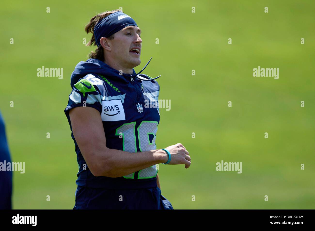 Seattle Seahawks wide receiver Jake Bobo runs through warm-up drills ...